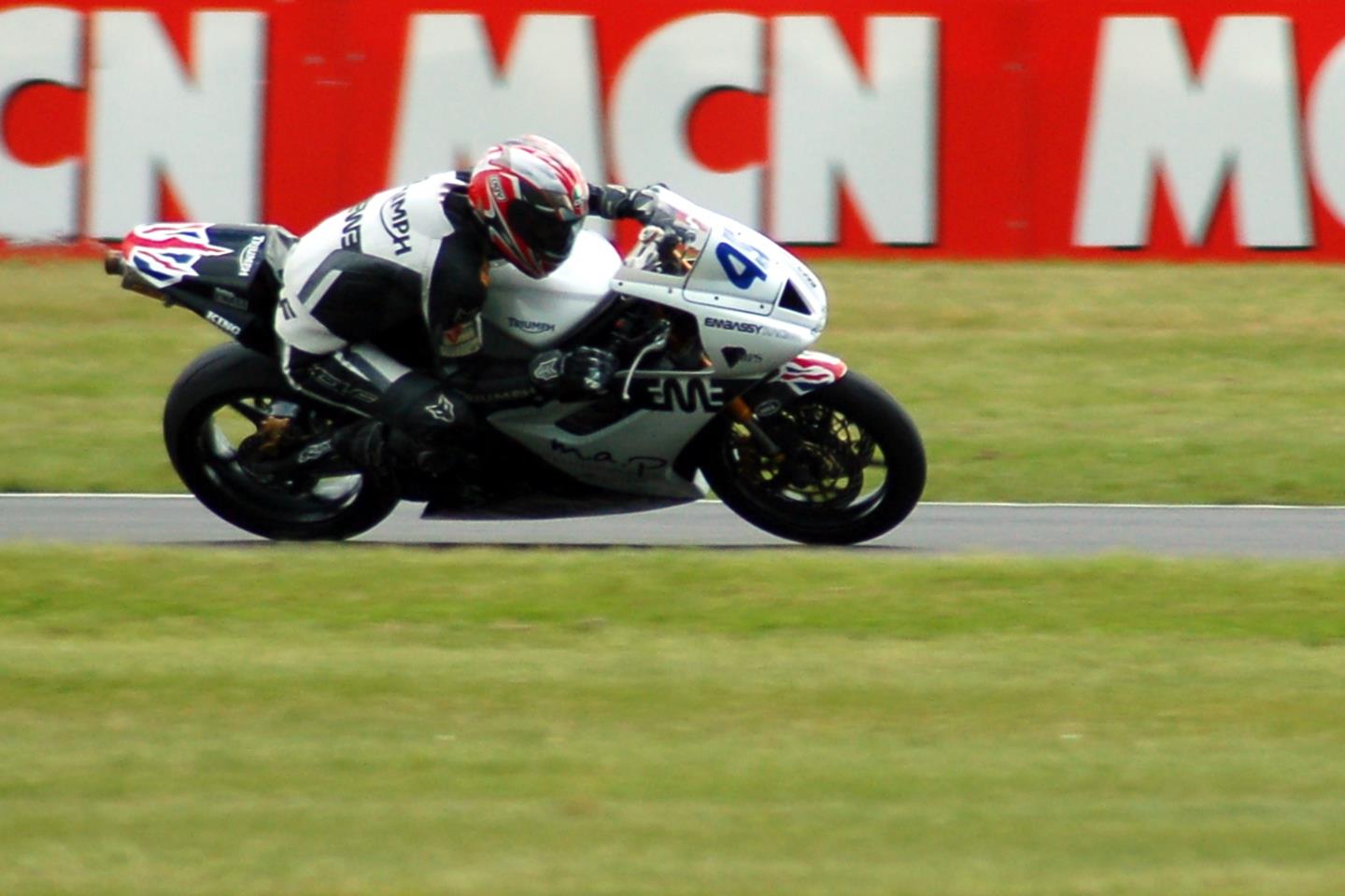 Glen Richards in front of MCN hoardings | MCN
