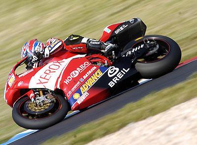 Lanzi takes surprise pole