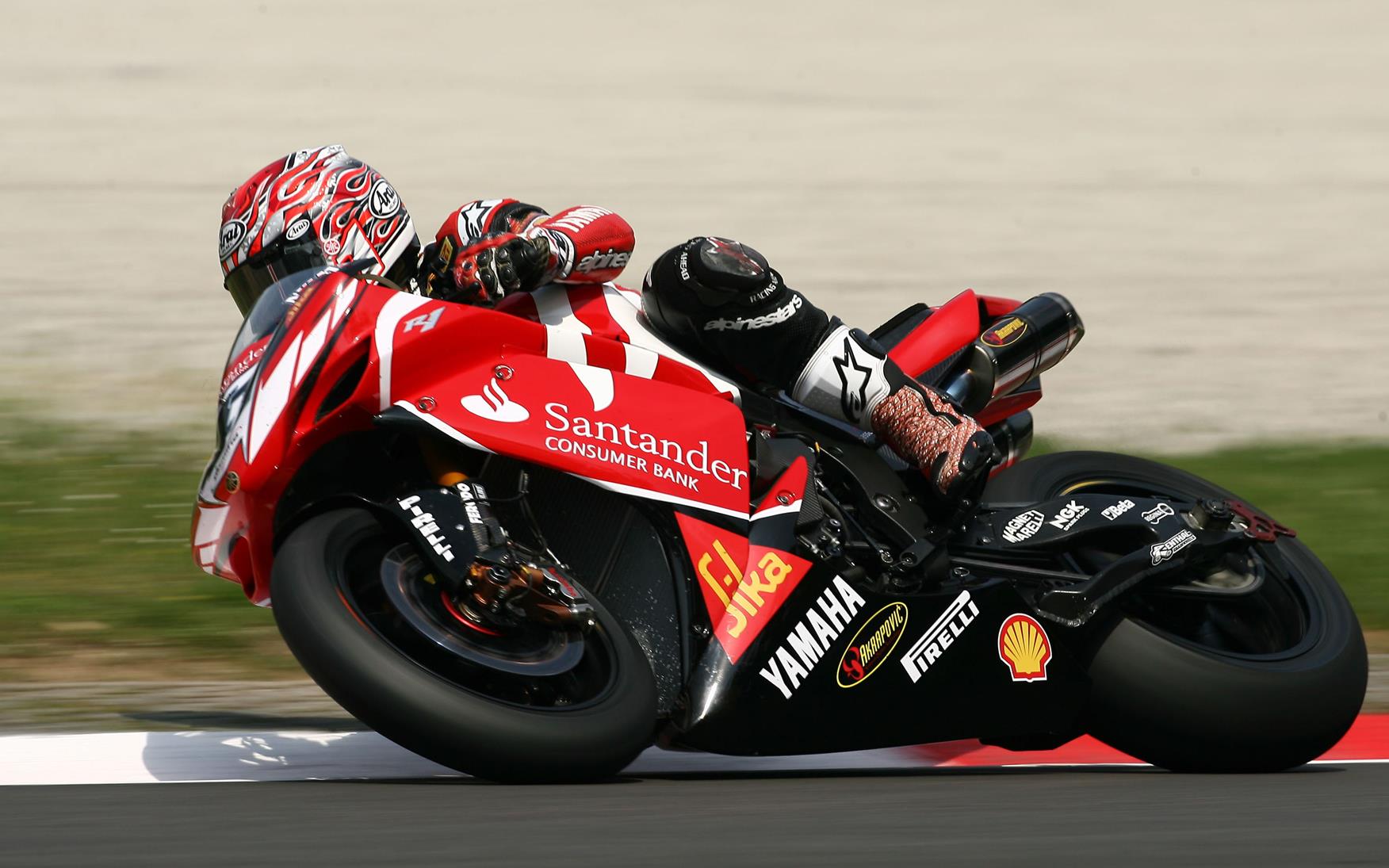 Haga takes his first win at Monza