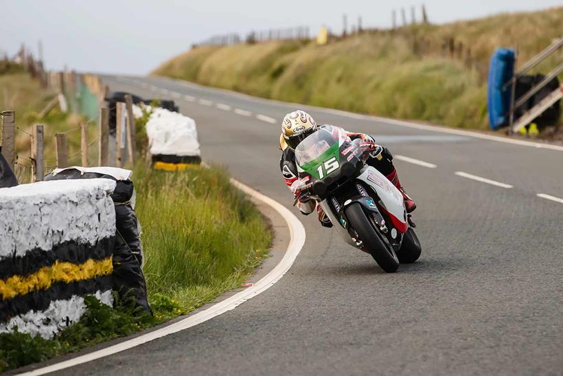 Michael Dunlop secures 31st TT win in opening Supertwin race