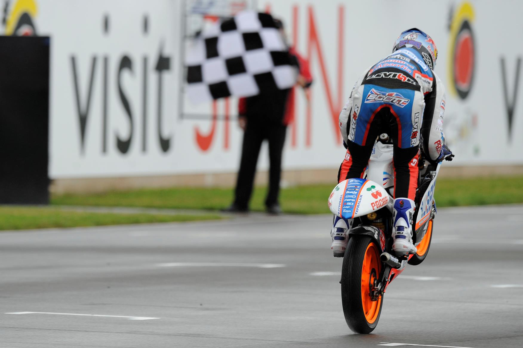 British MotoGP: Redding third in five-lap GP125 dash | MCN