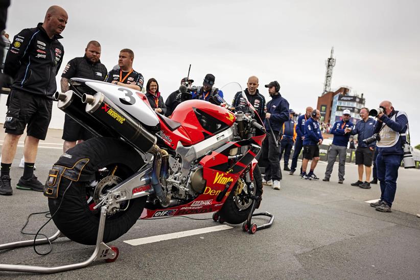 Michael Dunlop celebrates uncle Joey Dunlop with SP-1 TT lap