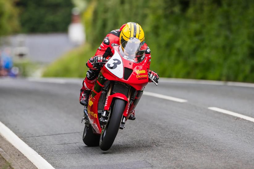 Michael Dunlop celebrates uncle Joey Dunlop with SP-1 TT lap