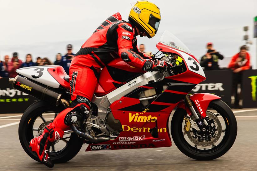Michael Dunlop celebrates uncle Joey Dunlop with SP-1 TT lap