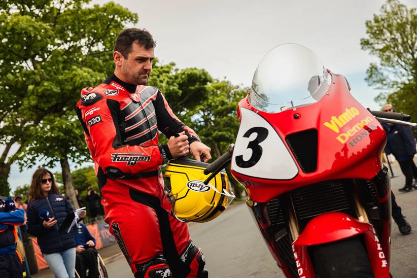 Michael Dunlop celebrates uncle Joey Dunlop with SP-1 TT lap