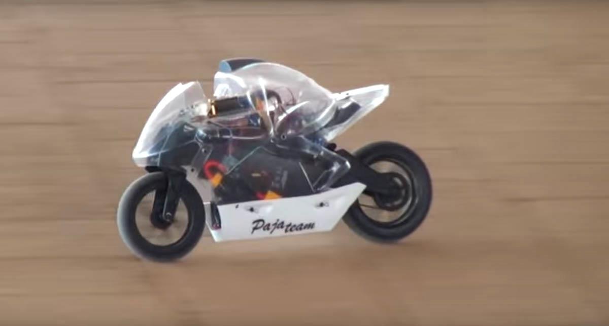 Riderless motorcycle attempts to outperform human riders
