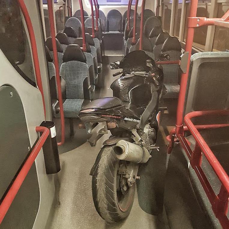 Rider (and bike) get a lift from a bus!